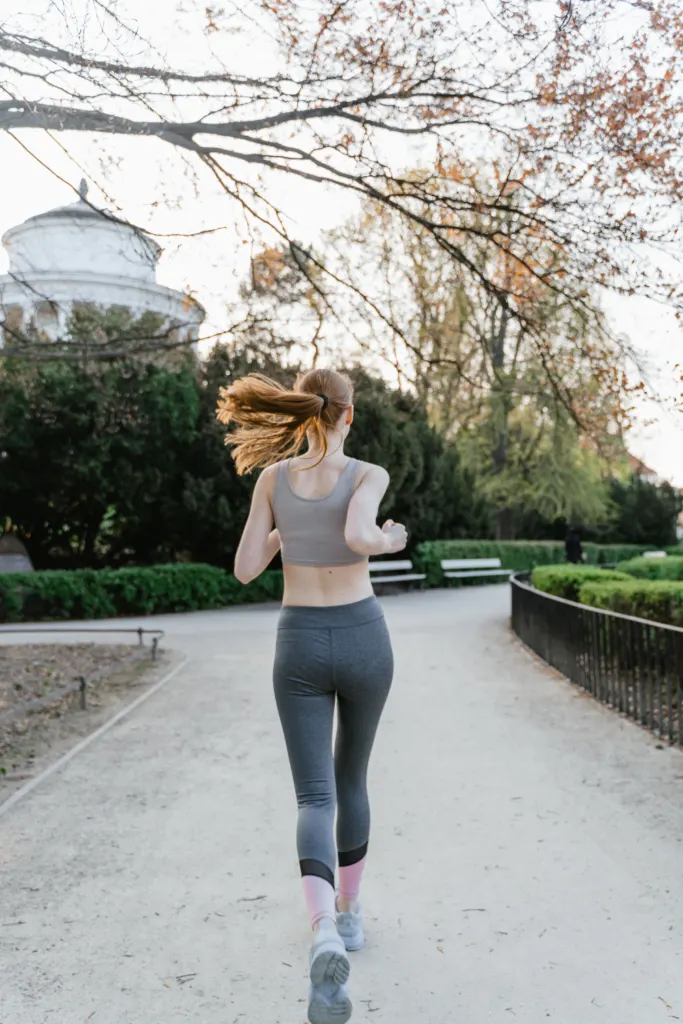 How many miles should I run a day? Benefits + risks of running every ...